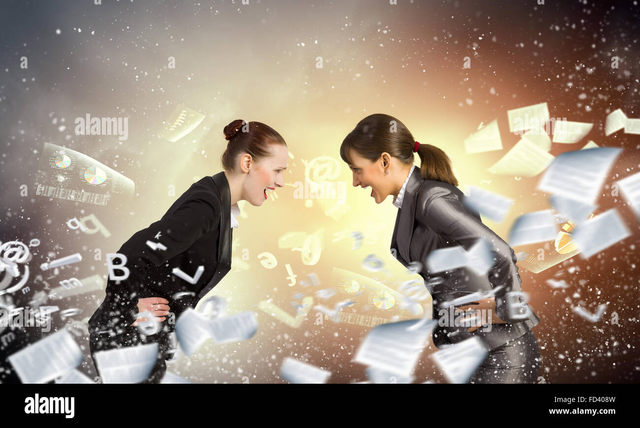 Two businesswomen fighting in office hi-res stock photography and ...