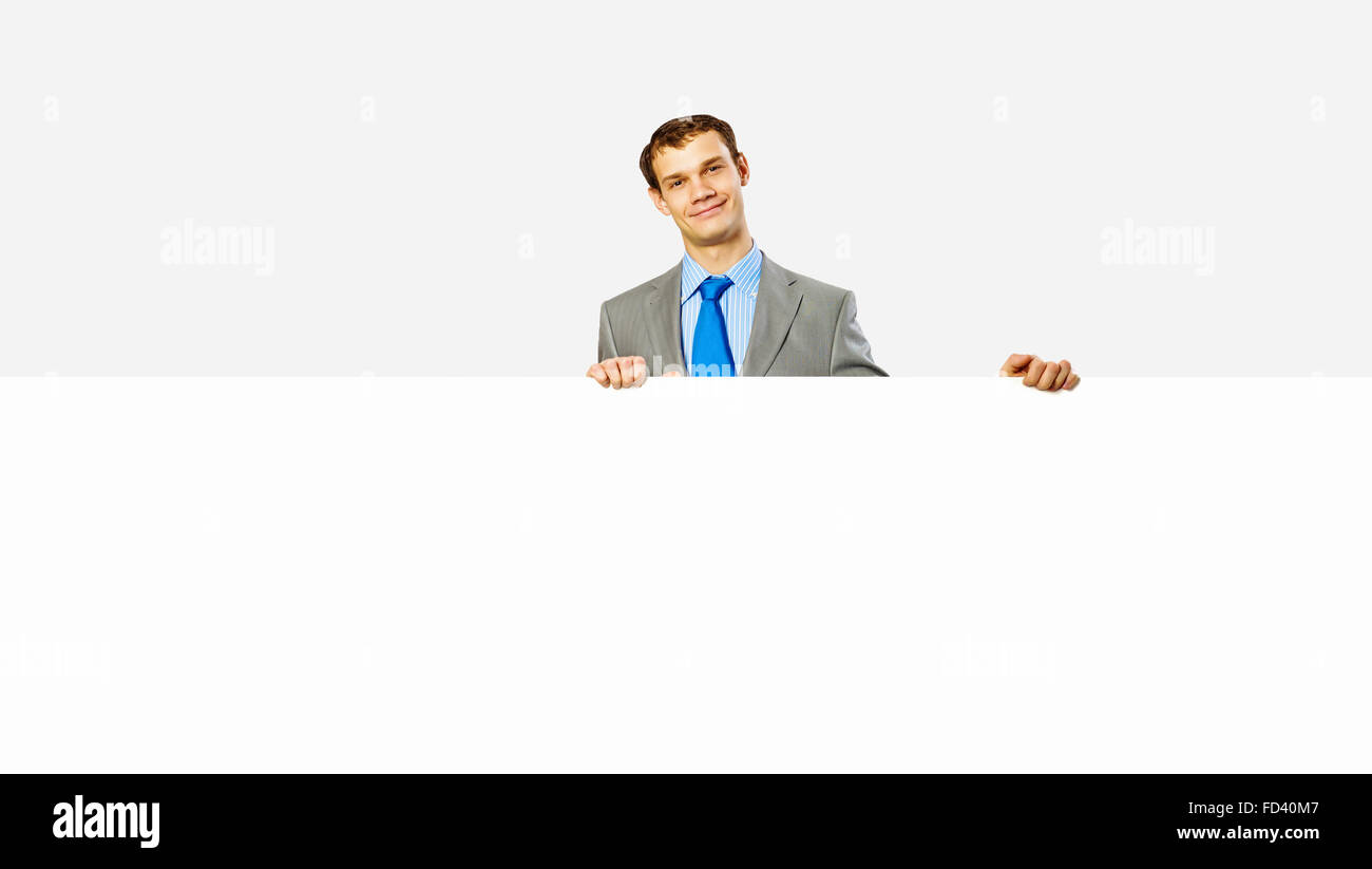 Advertising manager with billboard. Place for text Stock Photo - Alamy