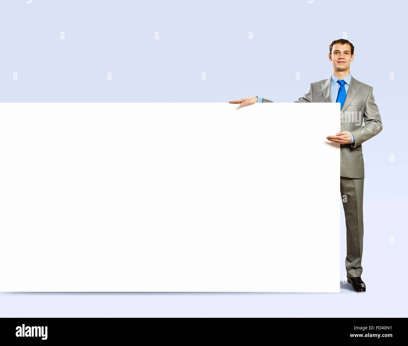 Advertising manager with billboard. Place for text Stock Photo - Alamy