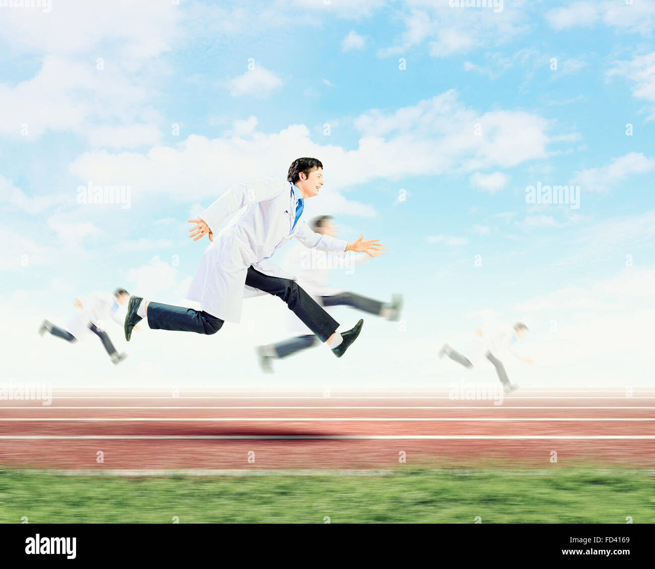 Funny image of young running doctor in white uniform Stock Photo - Alamy