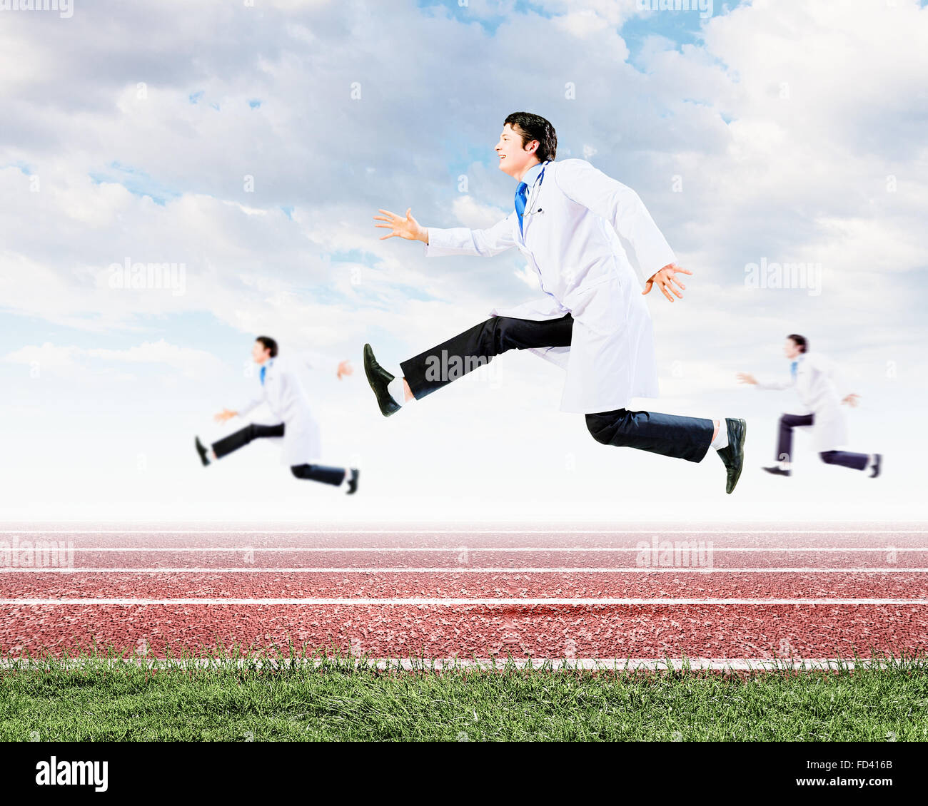 Funny image of young running doctor in white uniform Stock Photo - Alamy