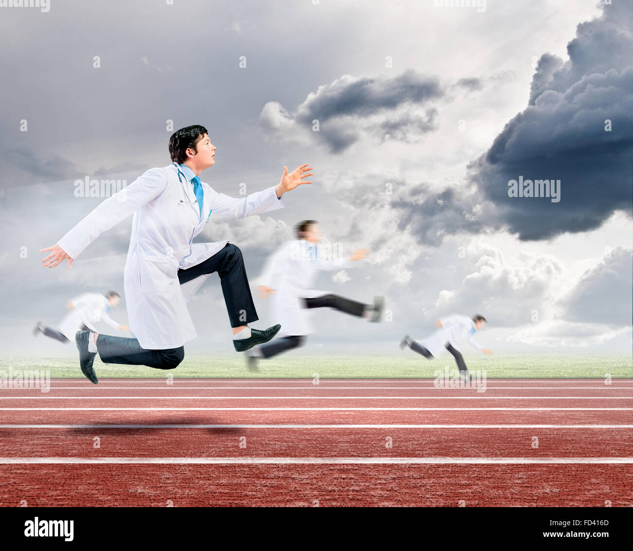 Funny image of young running doctor in white uniform Stock Photo - Alamy