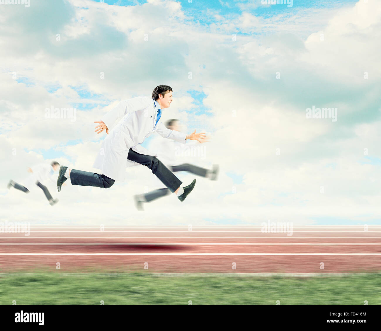 Funny image of young running doctor in white uniform Stock Photo - Alamy