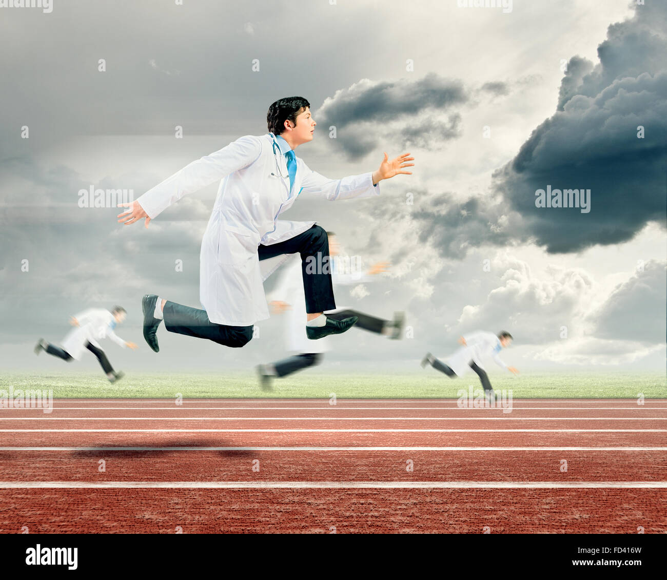 Funny image of young running doctor in white uniform Stock Photo - Alamy