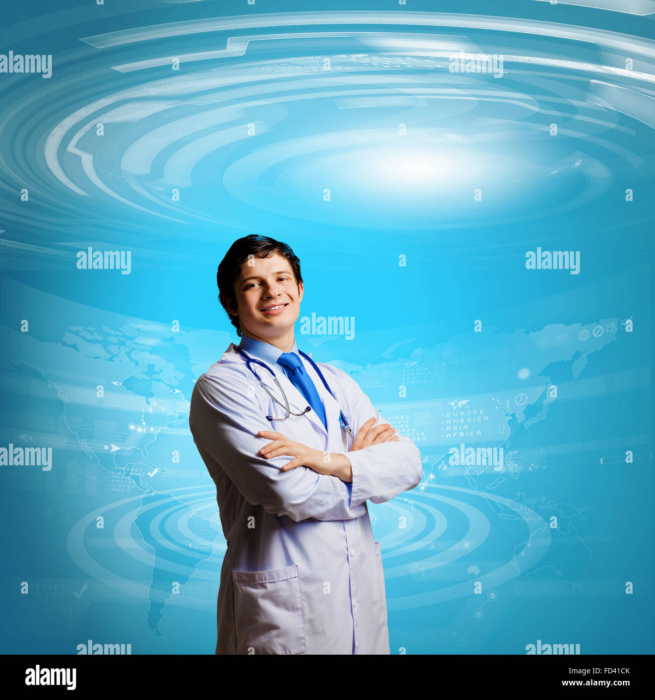 Image of young thoughtful doctor looking at media screen Stock Photo ...