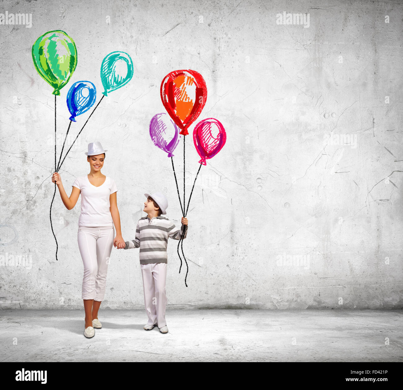 Image of young happy smiling family walking Stock Photo - Alamy