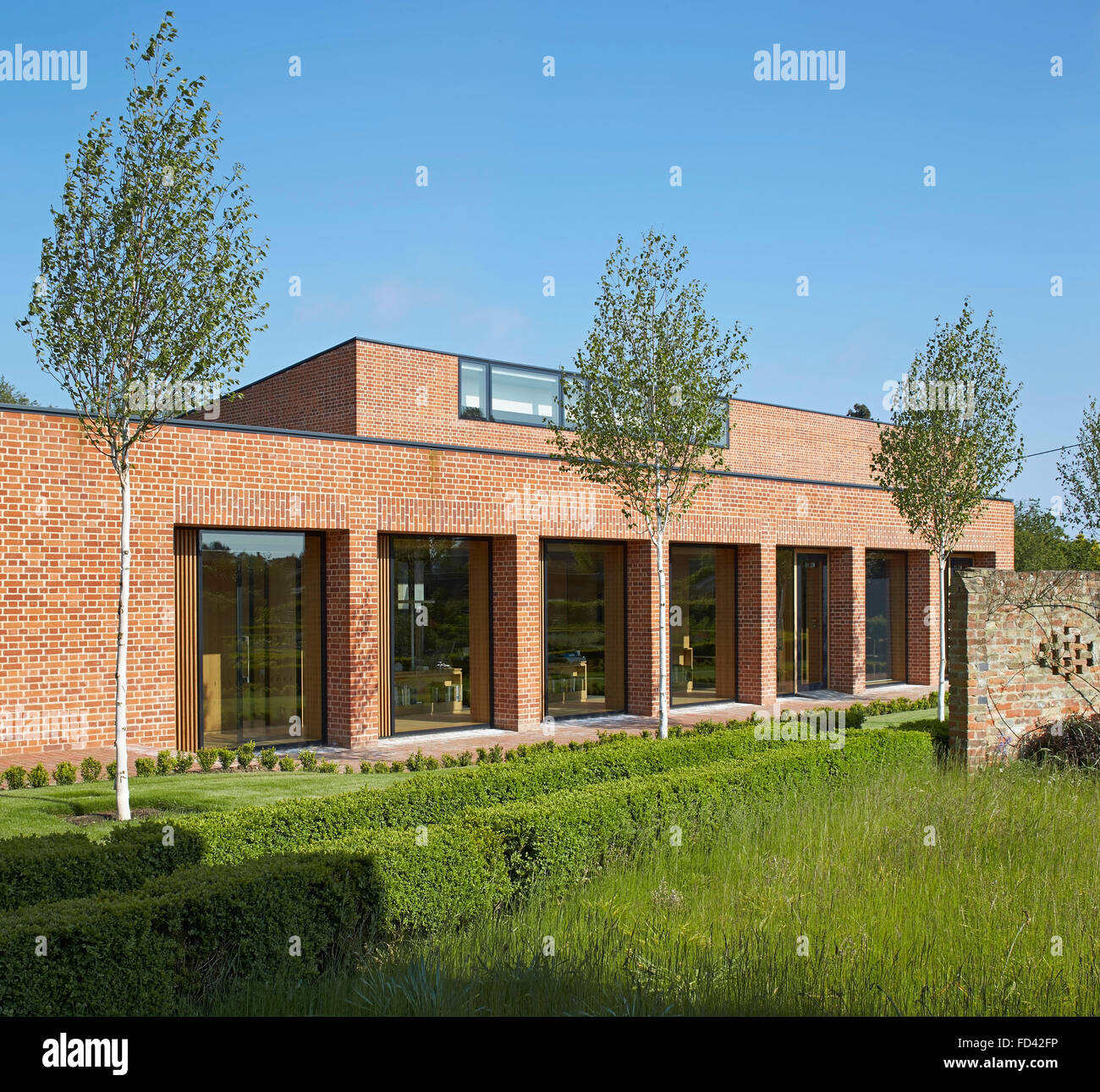 Brick piers with recessed full-height windows. Britten-Pears Archive ...
