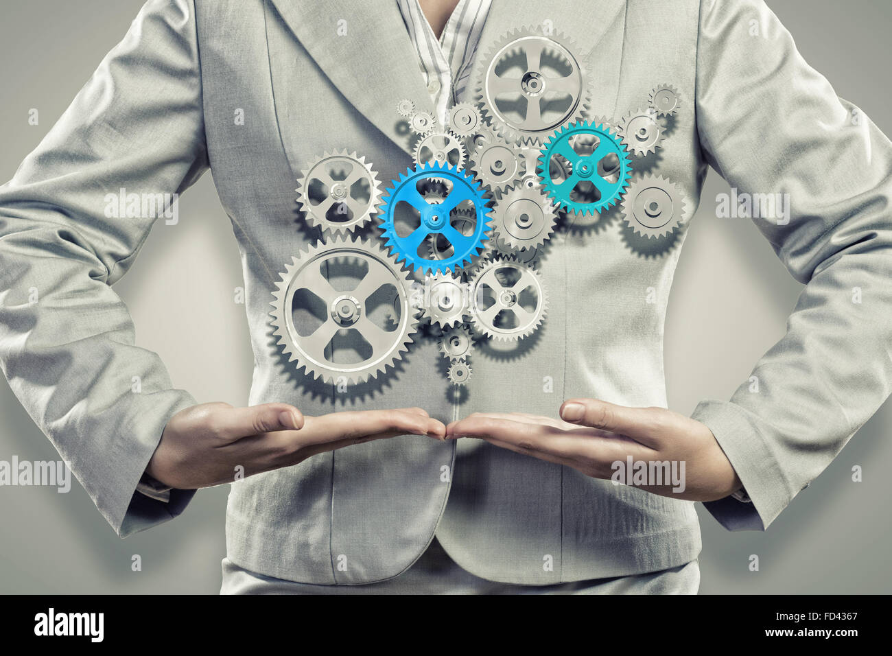 Holding gears hi-res stock photography and images - Alamy