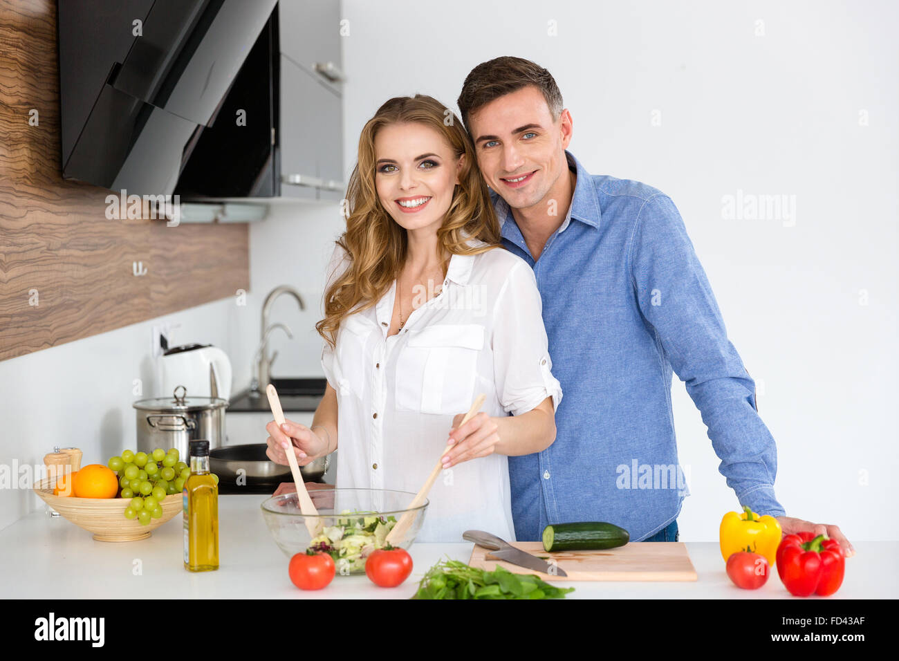 Man woman cooking delicious hi-res stock photography and images - Alamy