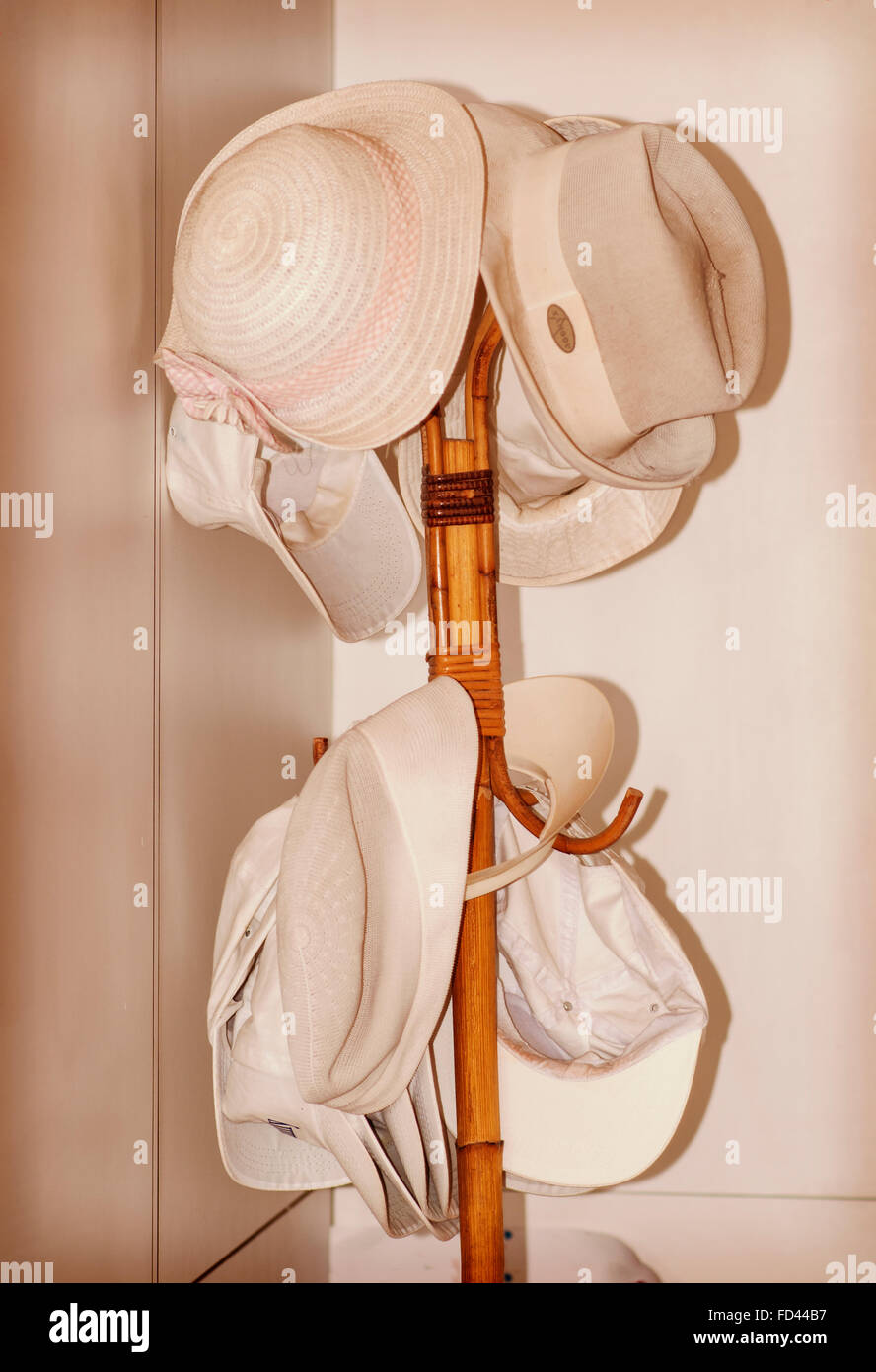Wooden hat stand hi-res stock photography and images - Alamy