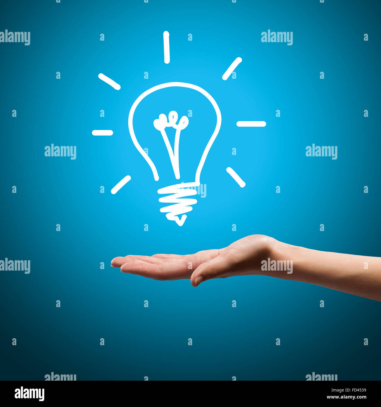 Close up image of human hand with drawn electrical bulb Stock Photo - Alamy