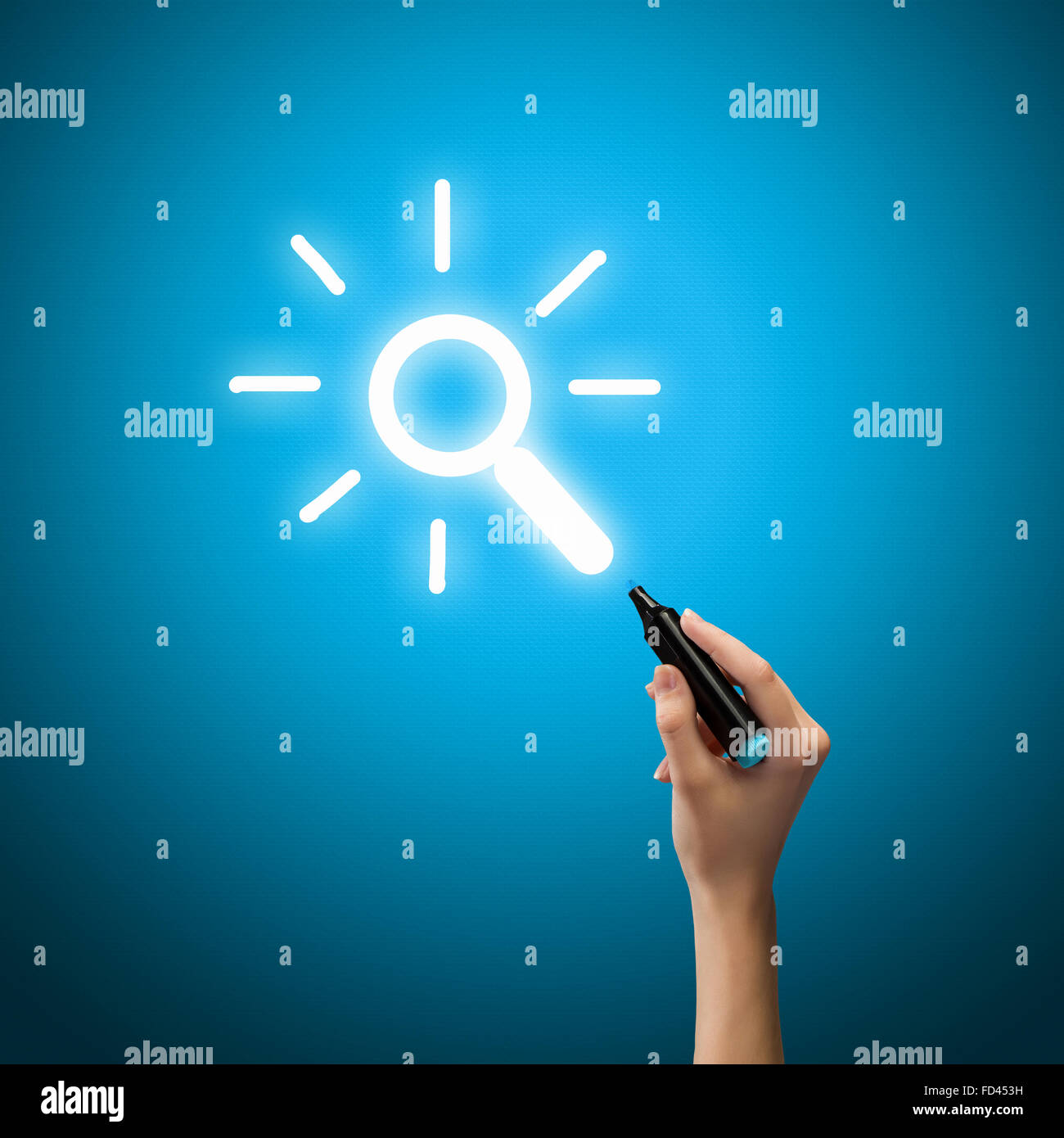 Close up of human hand drawing magnifier with marker Stock Photo - Alamy