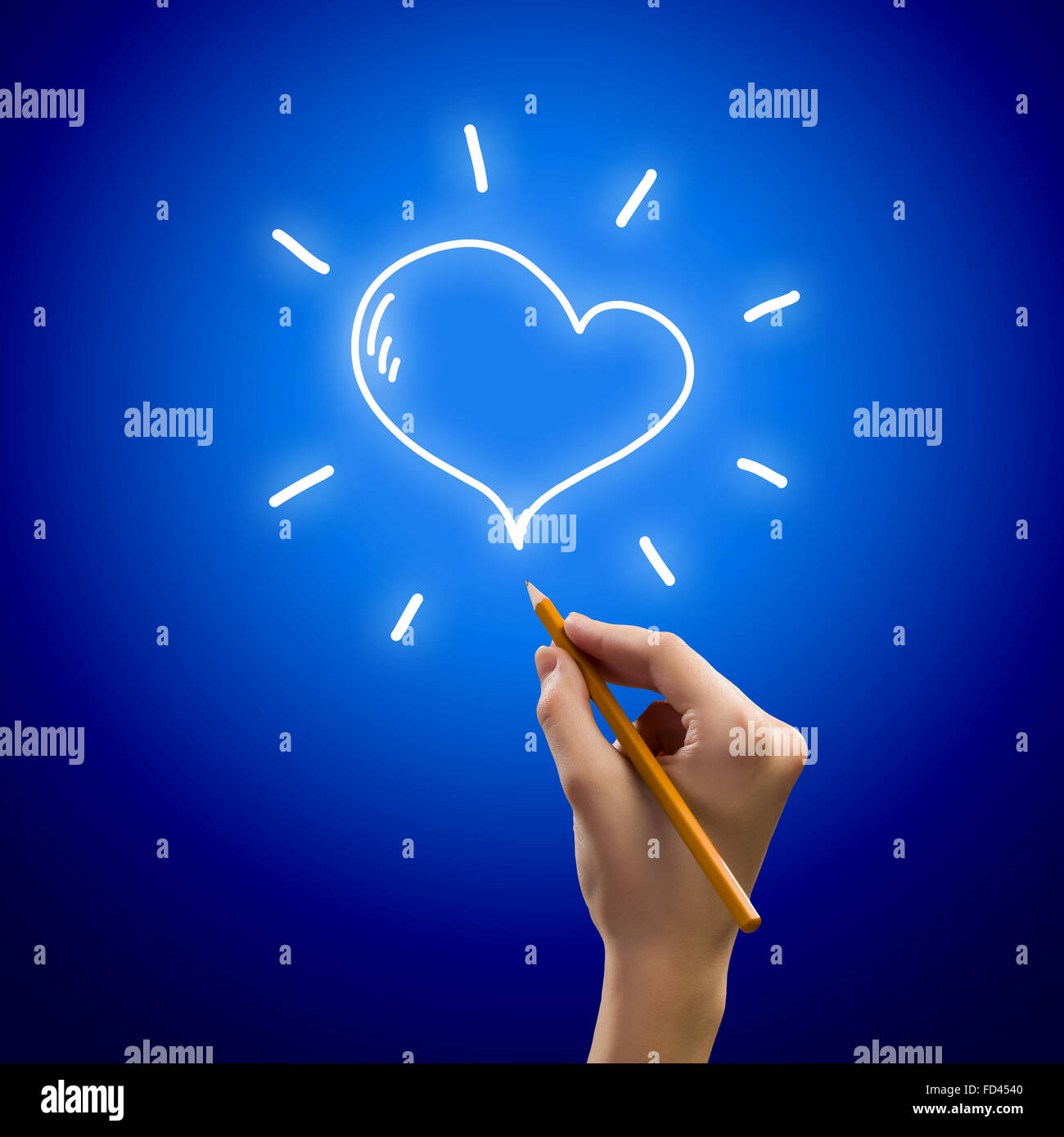 Close up image of human hand drawing heart Stock Photo - Alamy