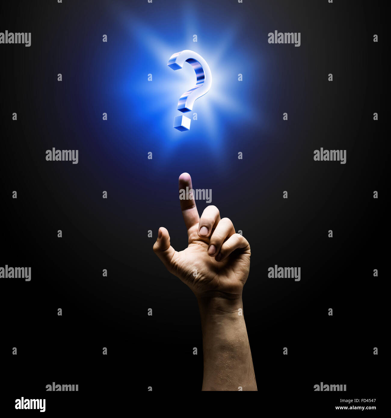 Human hand pointing with finger at question mark Stock Photo - Alamy