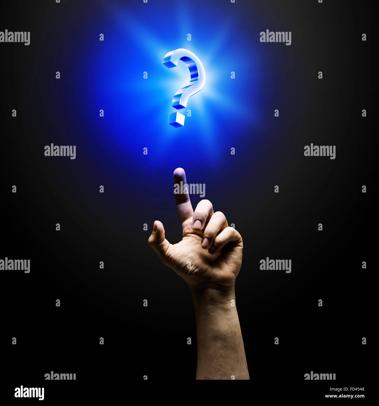 Human hand pointing with finger at question mark Stock Photo - Alamy