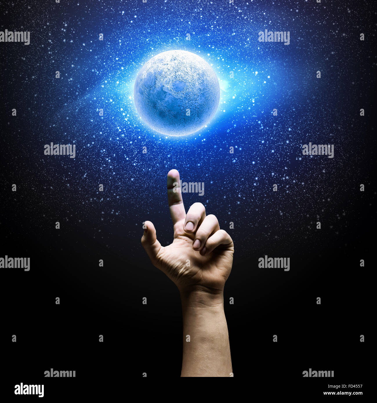 Human hand pointing at moon in space Stock Photo - Alamy
