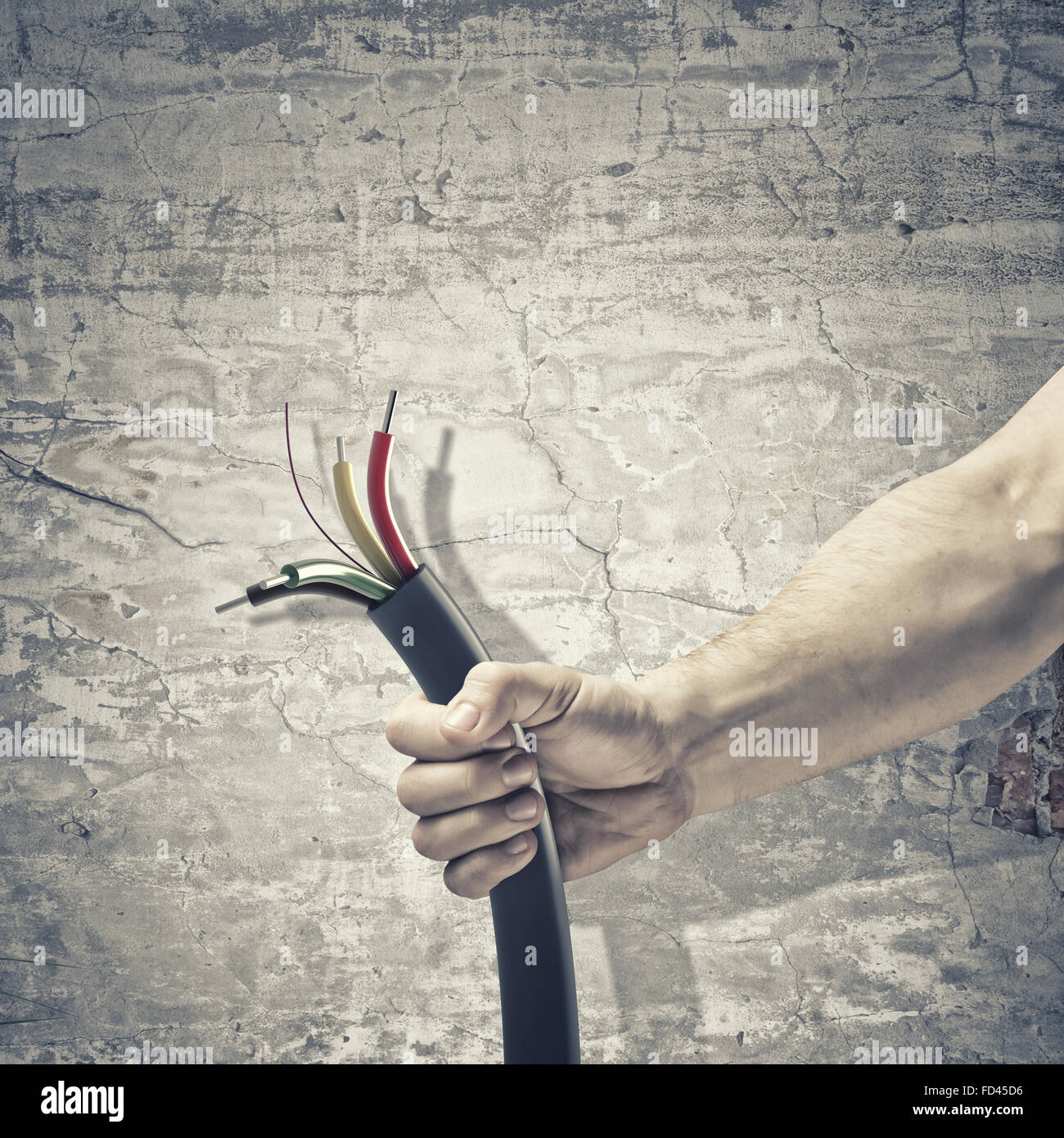 Cable in human hand. Power and connection Stock Photo - Alamy