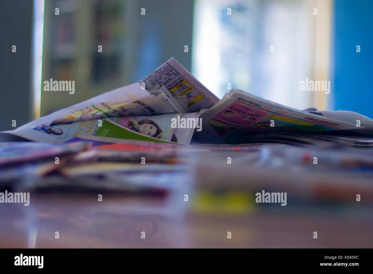 News papers and periodicals on the desk of library Stock Photo - Alamy