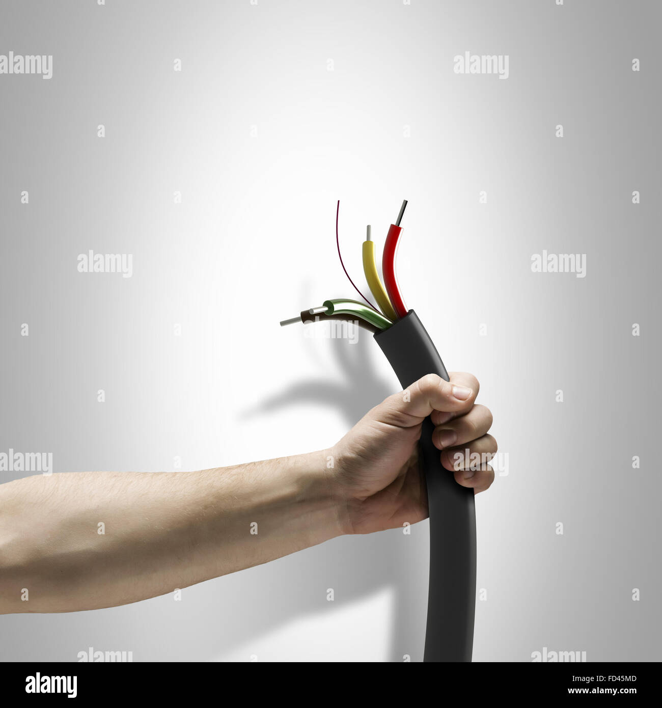 Cable in human hand. Power and connection Stock Photo - Alamy