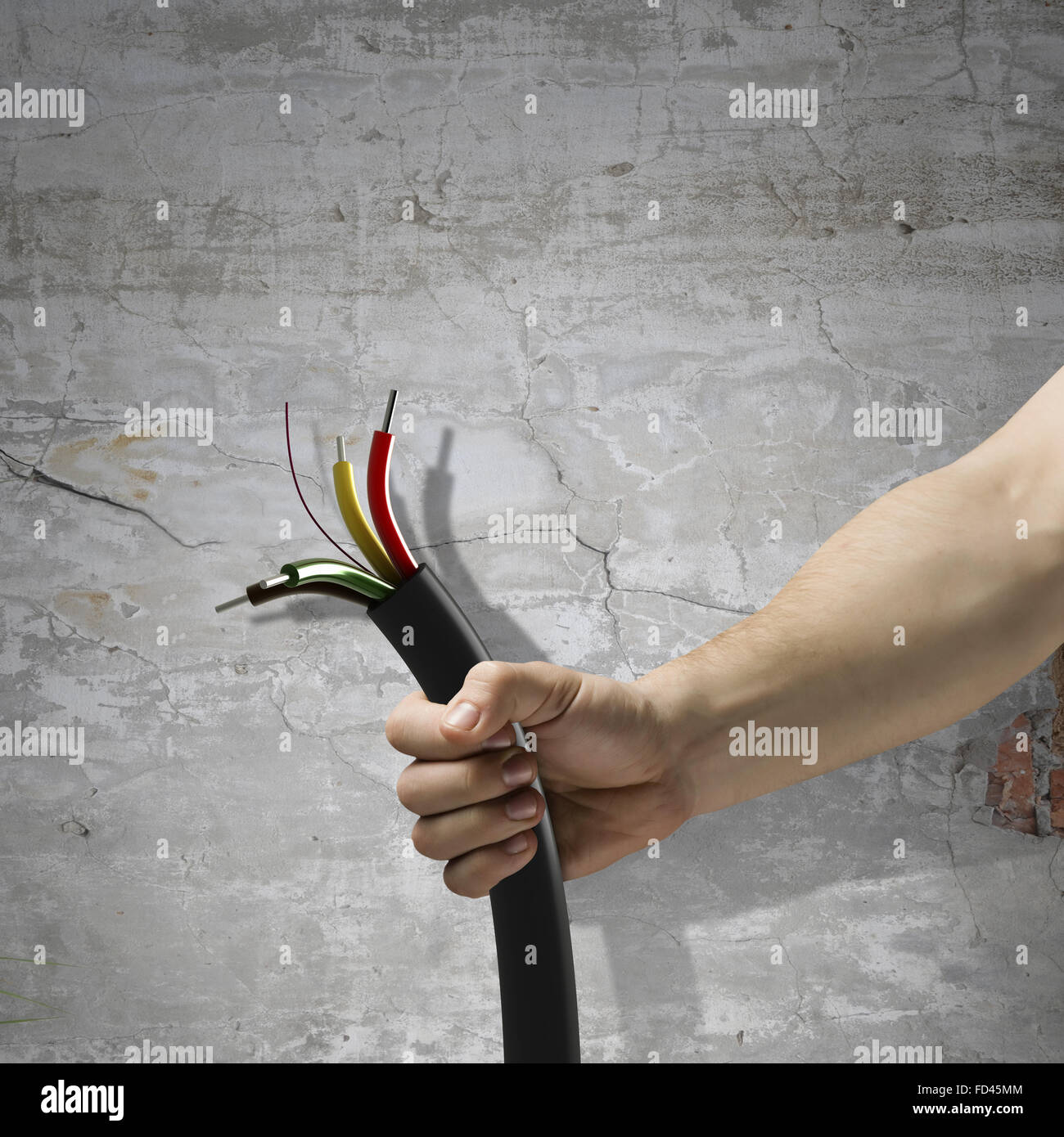 Cable in human hand. Power and connection Stock Photo - Alamy