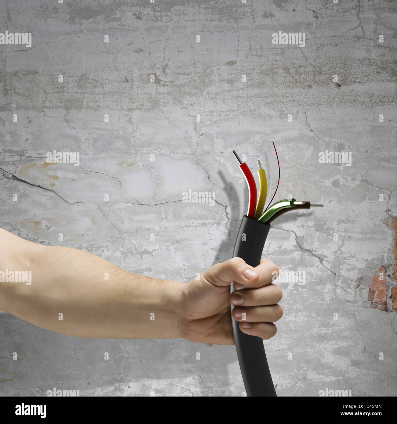 Cable in human hand. Power and connection Stock Photo - Alamy