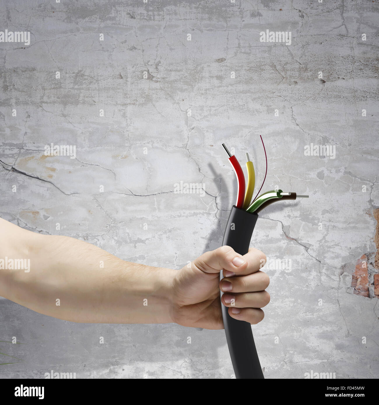 Cable in human hand. Power and connection Stock Photo - Alamy