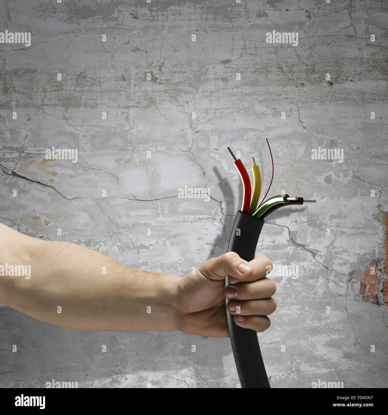 Cable in human hand. Power and connection Stock Photo - Alamy