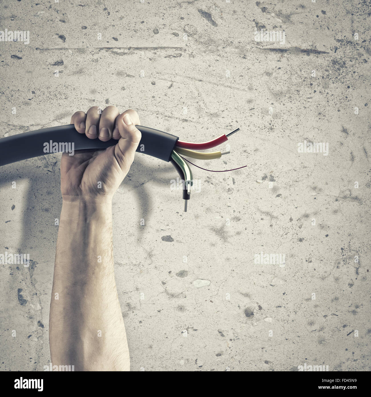 Cable in human hand. Power and connection Stock Photo - Alamy