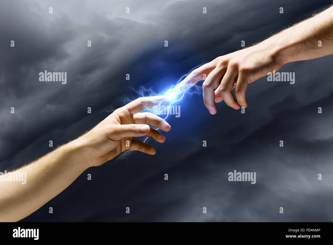 Michelangelo God's touch. Close up of human hands touching with fingers ...