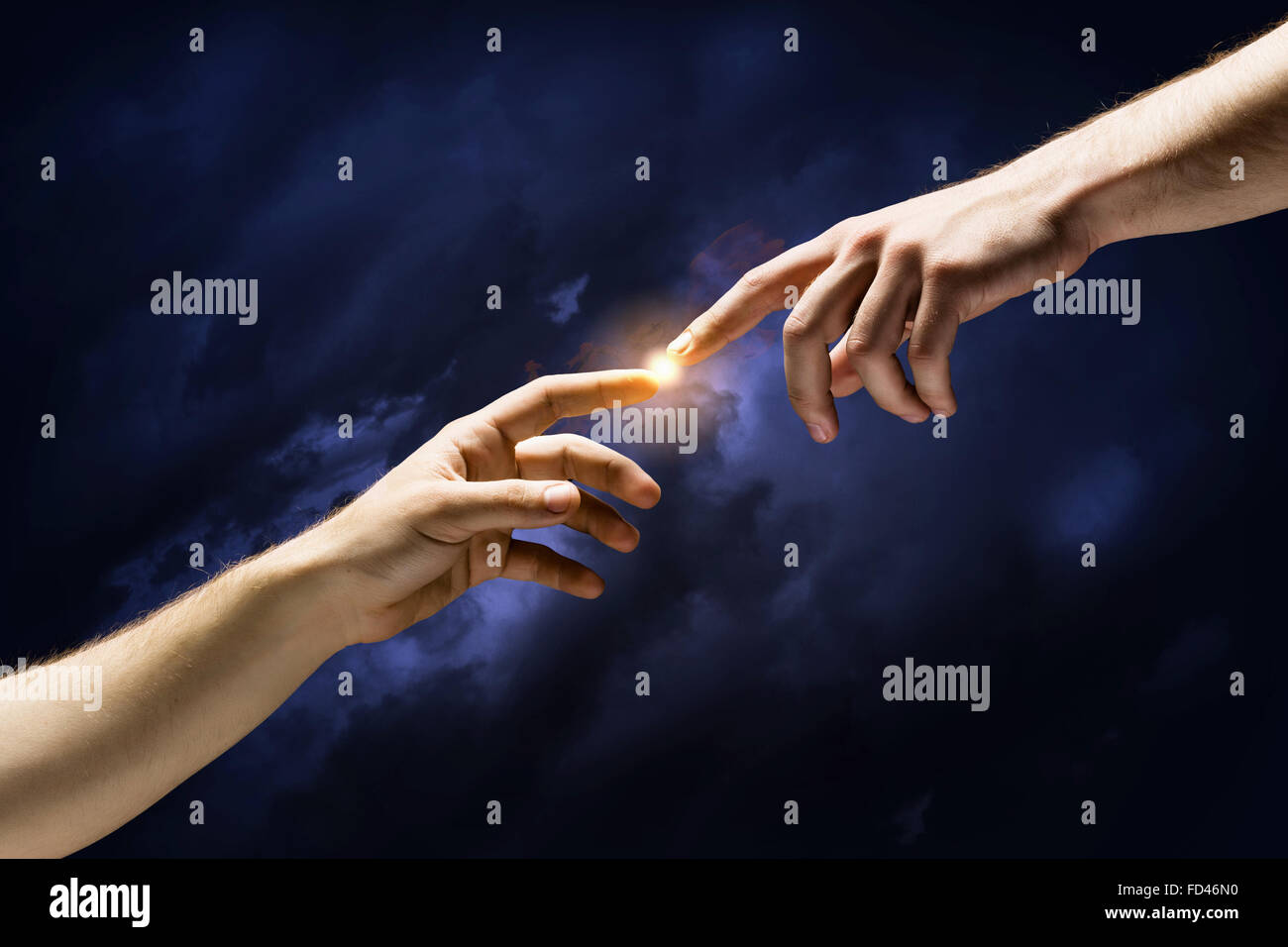 Michelangelo God's touch. Close up of human hands touching with fingers ...