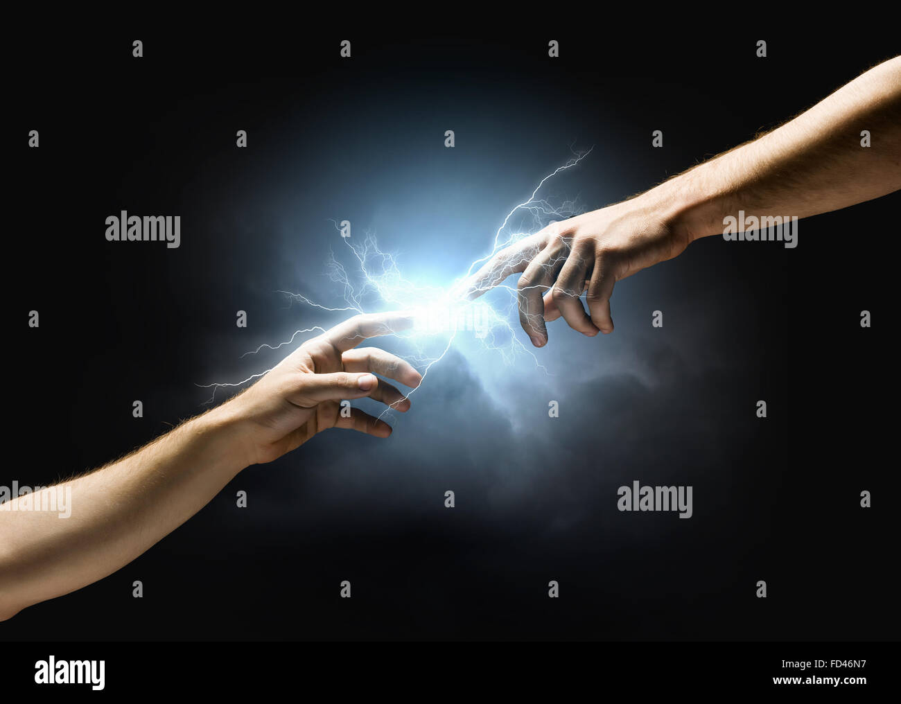 Michelangelo God's touch. Close up of human hands touching with fingers ...