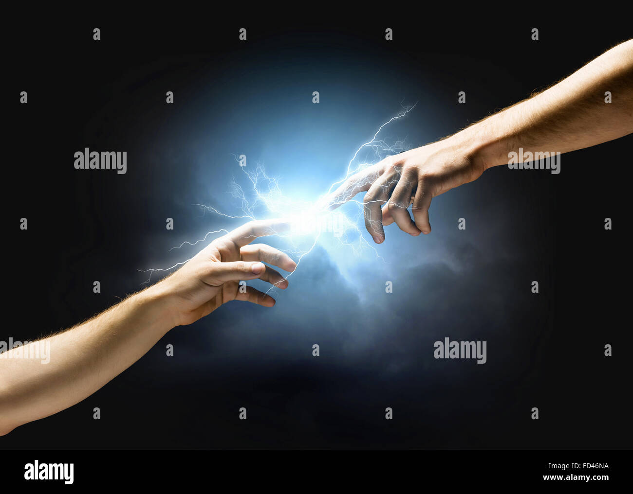 Michelangelo God's touch. Close up of human hands touching with fingers ...