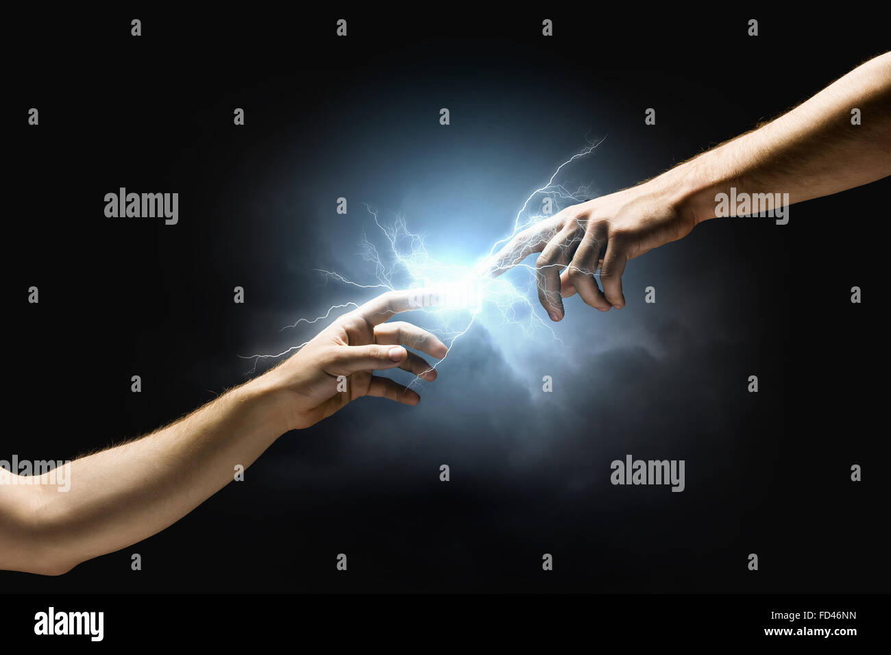 Michelangelo God's touch. Close up of human hands touching with fingers ...