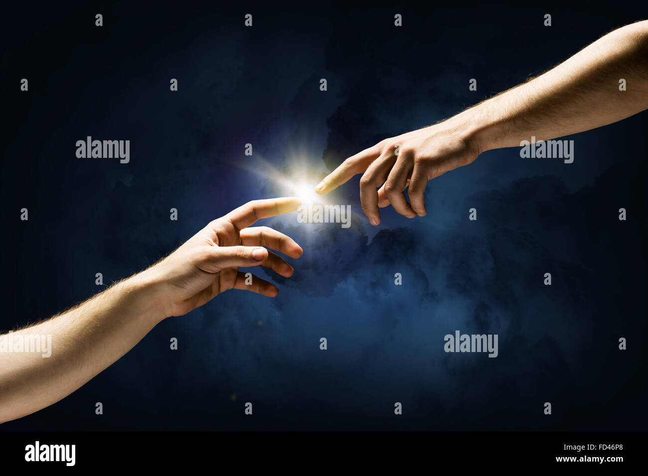 Michelangelo God's touch. Close up of human hands touching with fingers ...