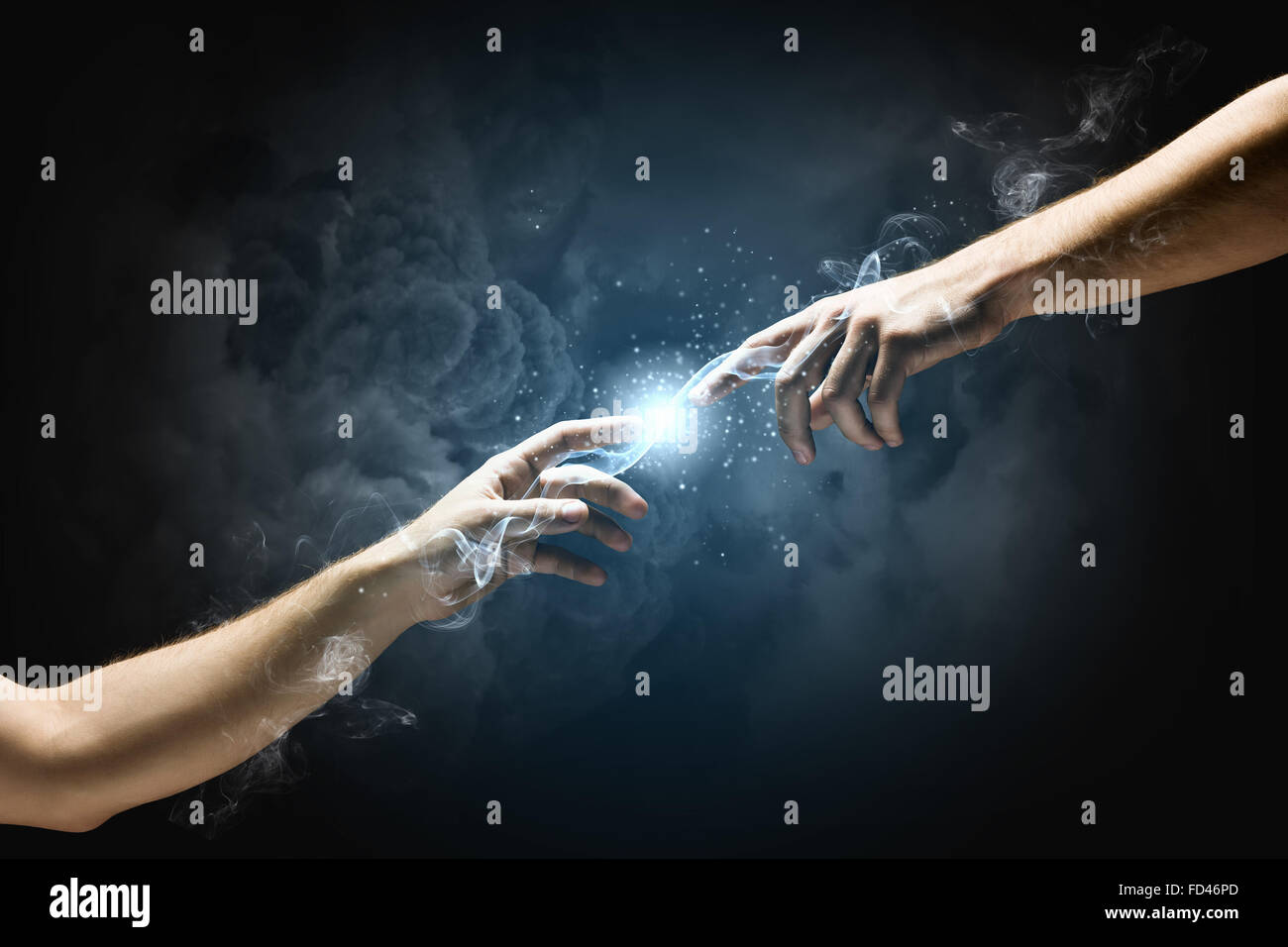 Michelangelo God's touch. Close up of human hands touching with fingers ...