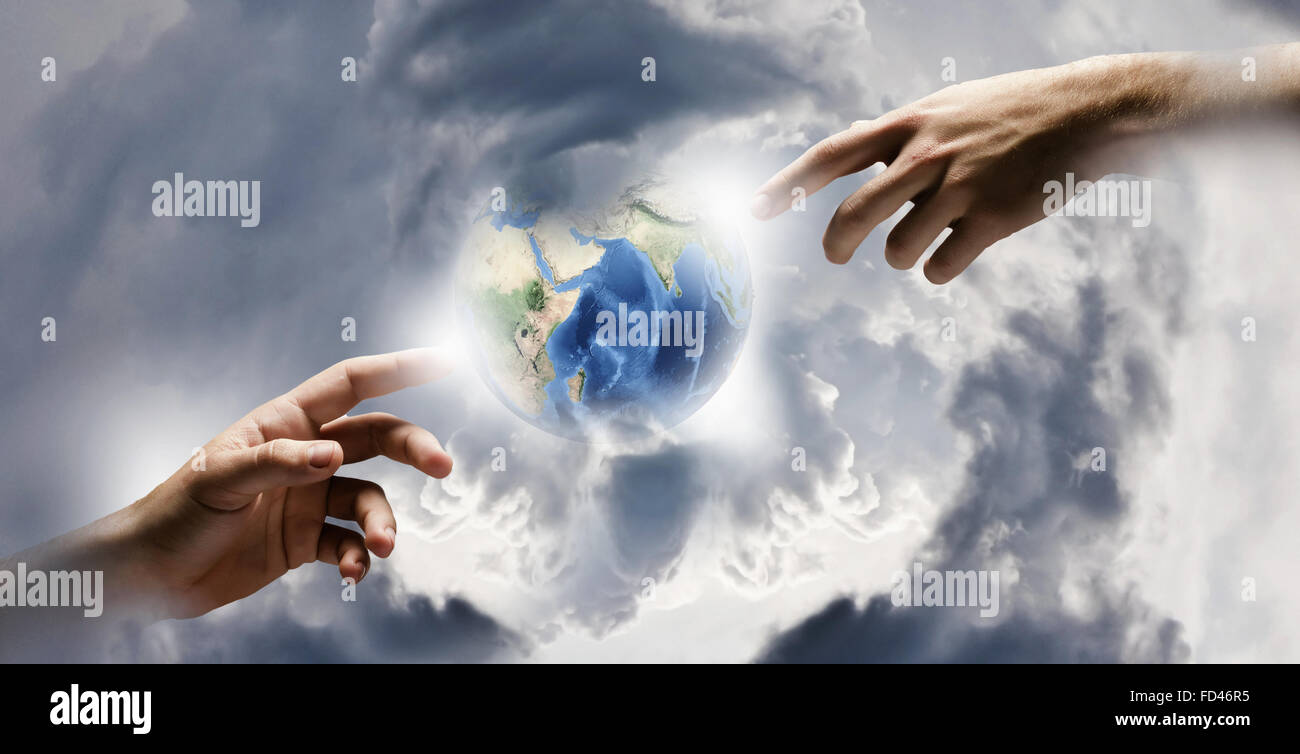 Creation adam michelangelo two hands hi-res stock photography and ...