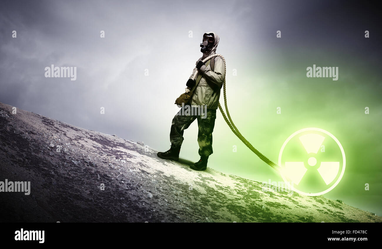 Stalker against nuclear background. Disaster and pollution Stock Photo ...