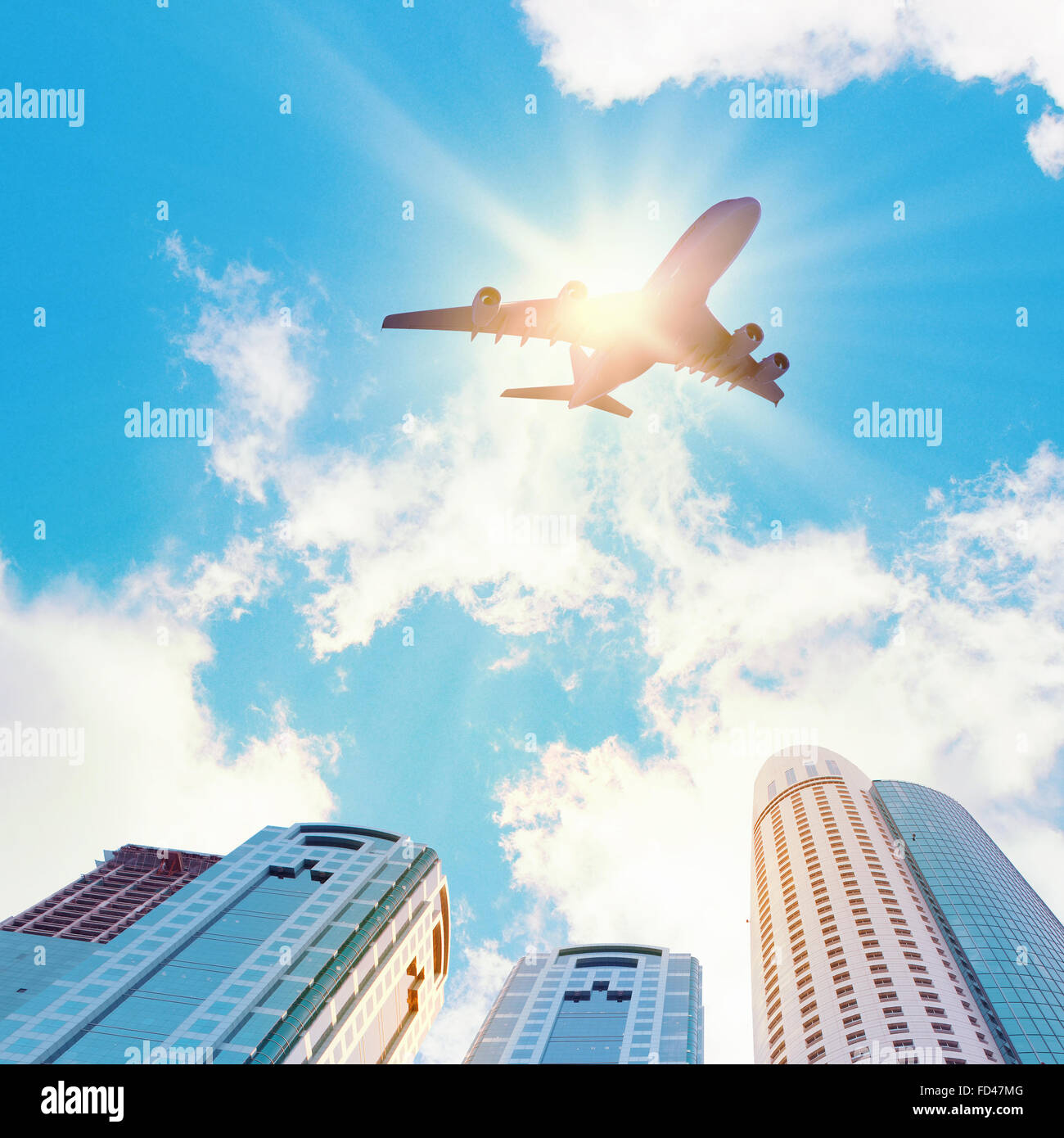 Jet flying above tall buildings hi-res stock photography and images - Alamy