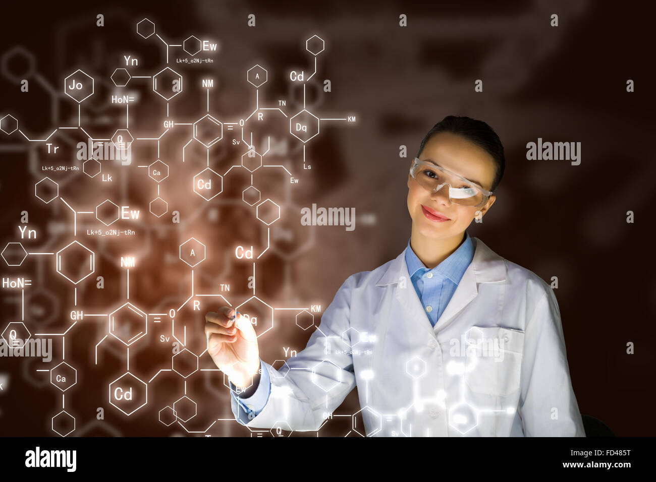 Young woman researcher in medical uniform drawing chemistry formulas ...