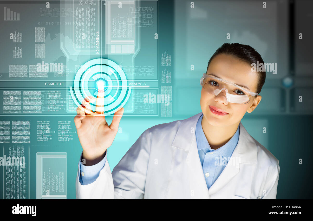 Image of young woman scientist touching icon of media screen Stock ...