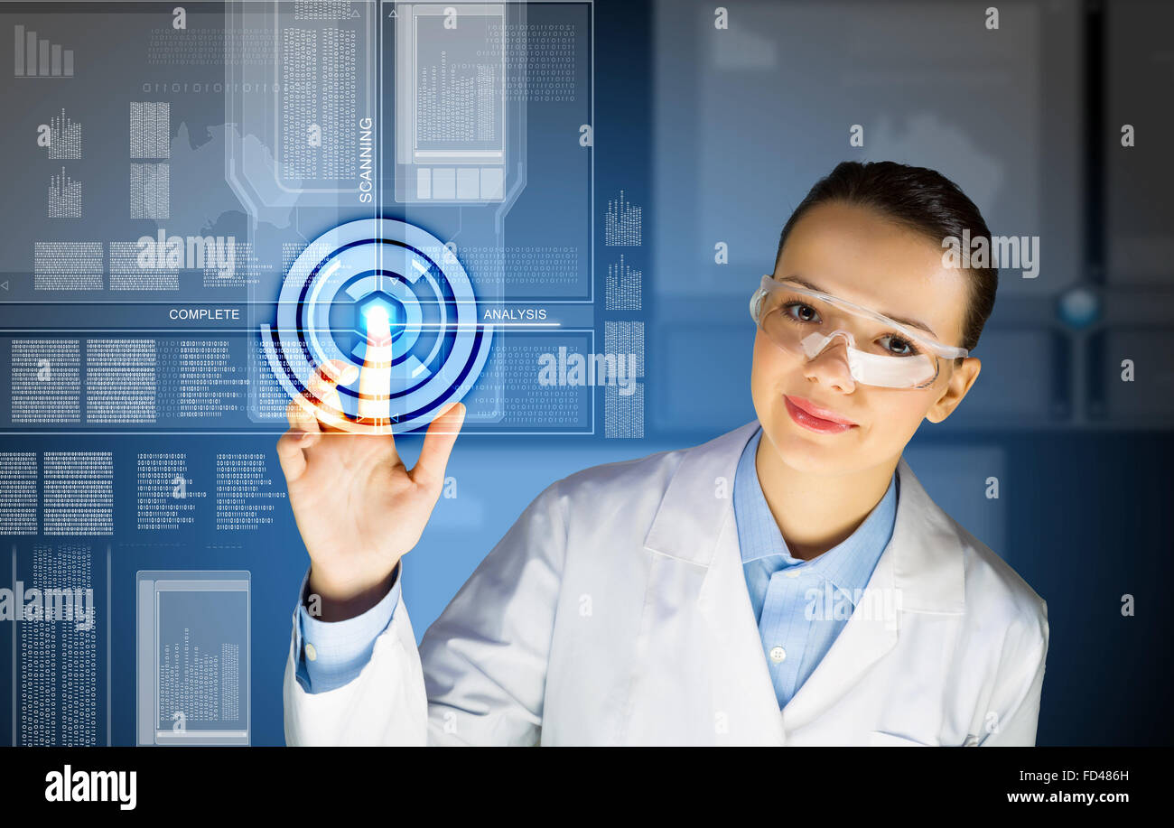 Image of young woman scientist touching icon of media screen Stock ...