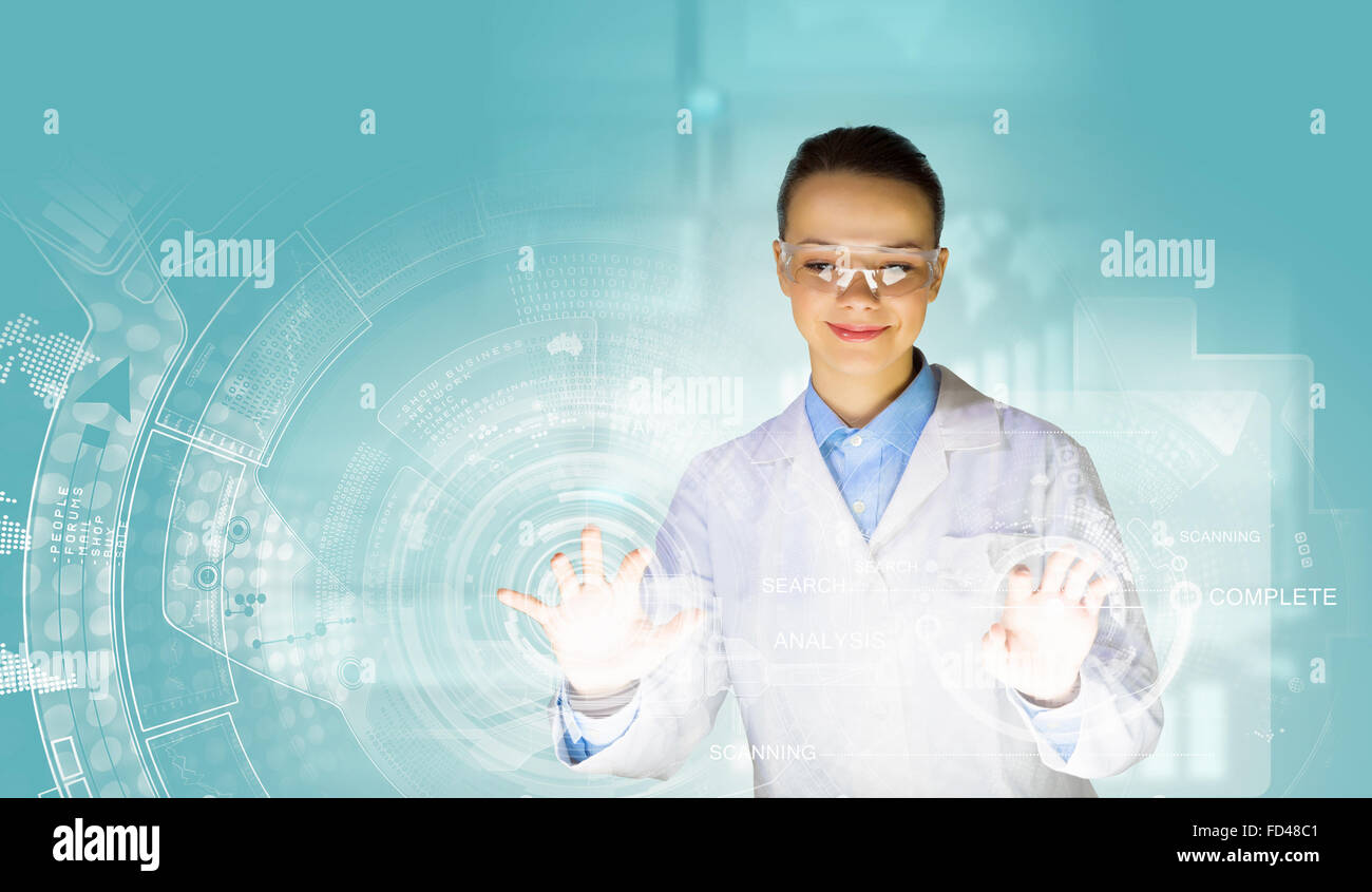 Image of young woman scientist touching icon of media screen Stock ...