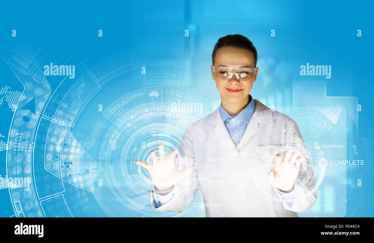 Image of young woman scientist touching icon of media screen Stock ...