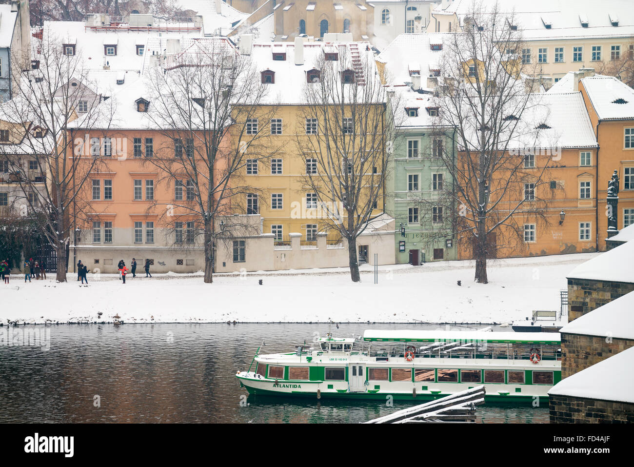 River Vltava and the colorful baroque houses in winter near Charles ...