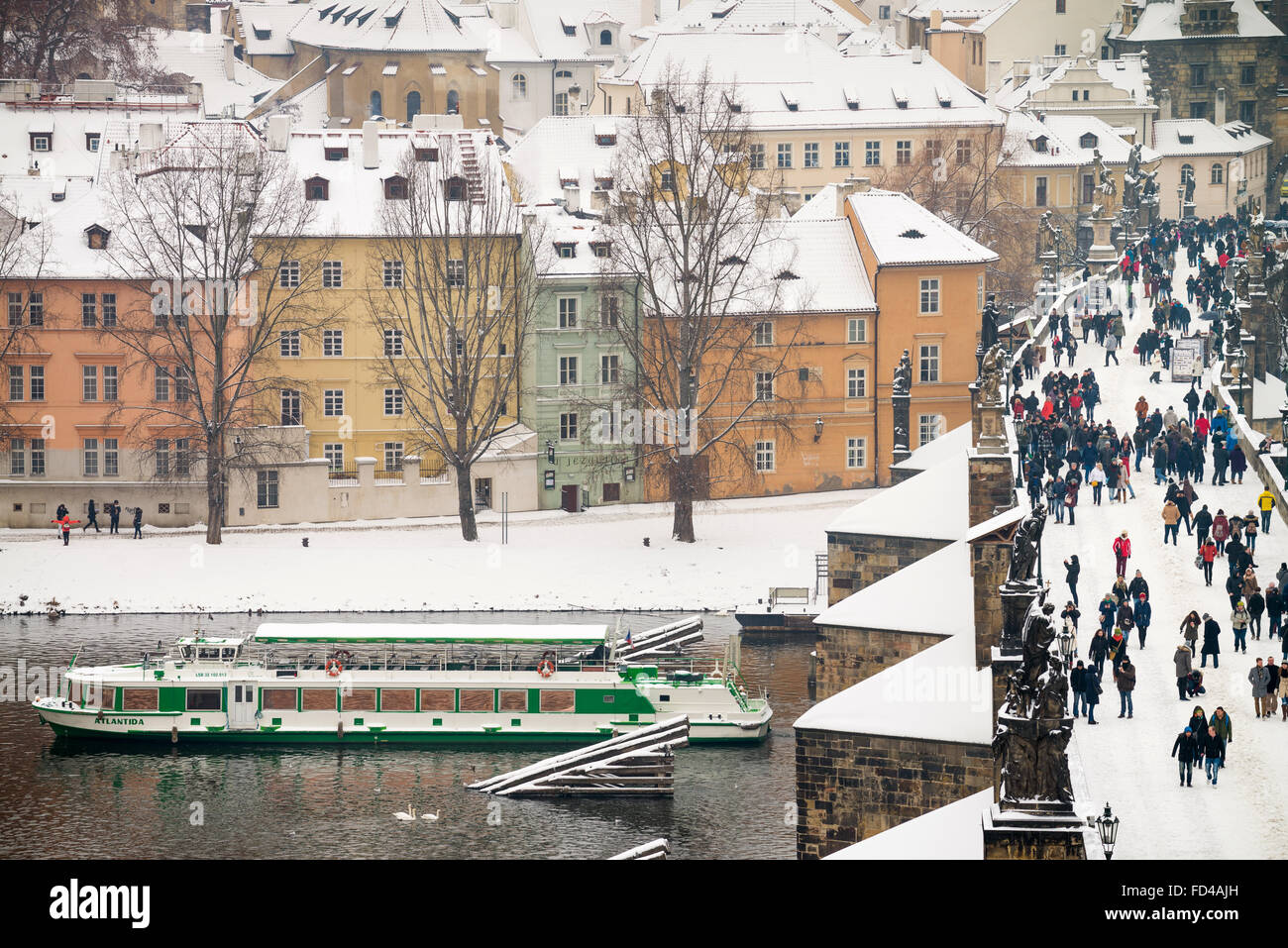 River Vltava and the colorful baroque houses in winter near Charles ...