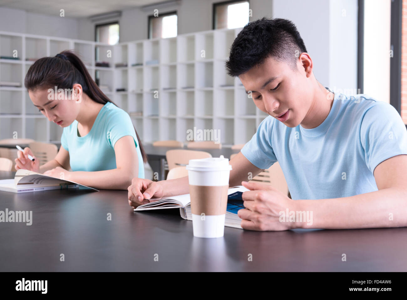 College students studying in library Stock Photo - Alamy