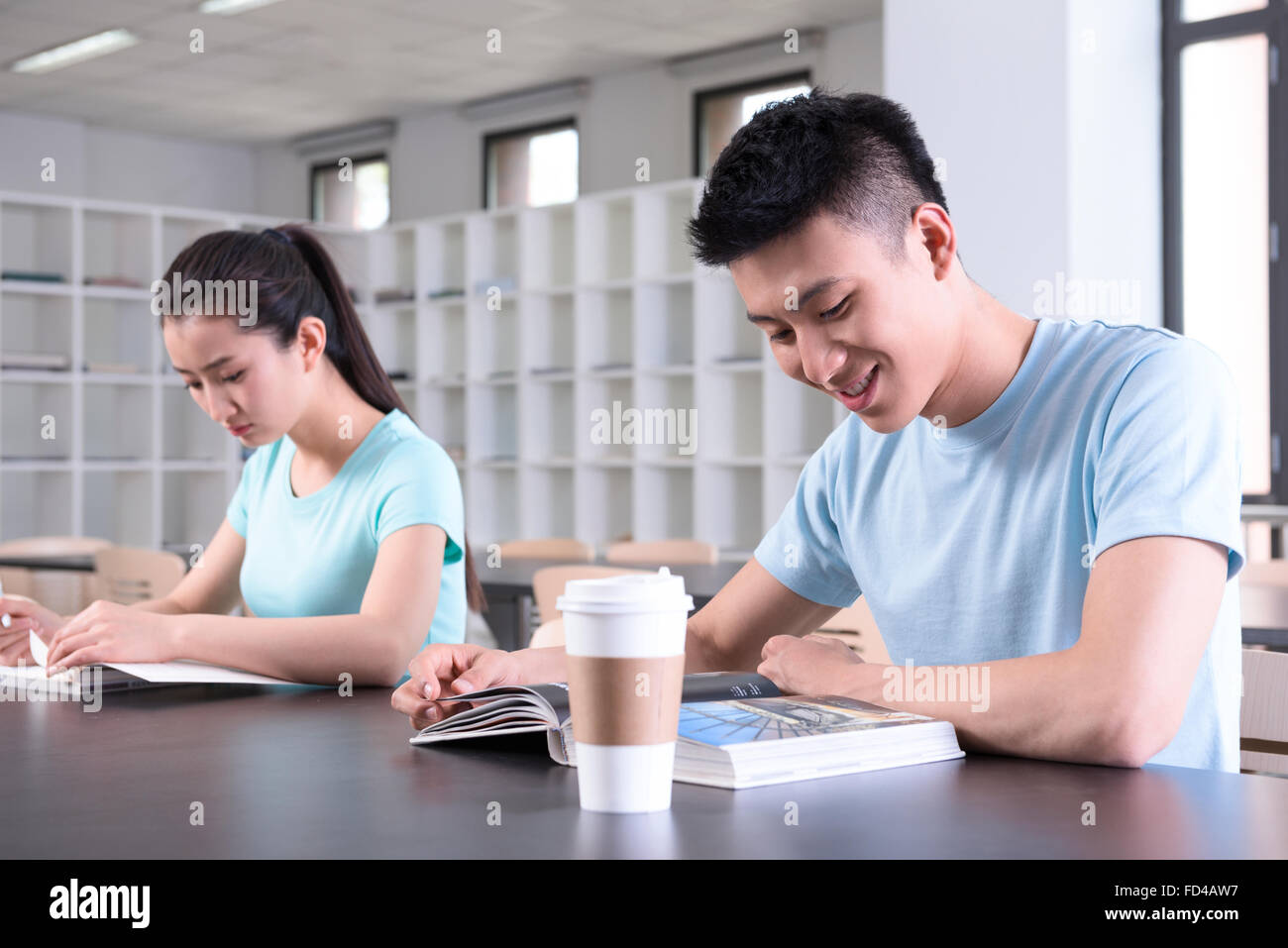 College students studying in library Stock Photo - Alamy