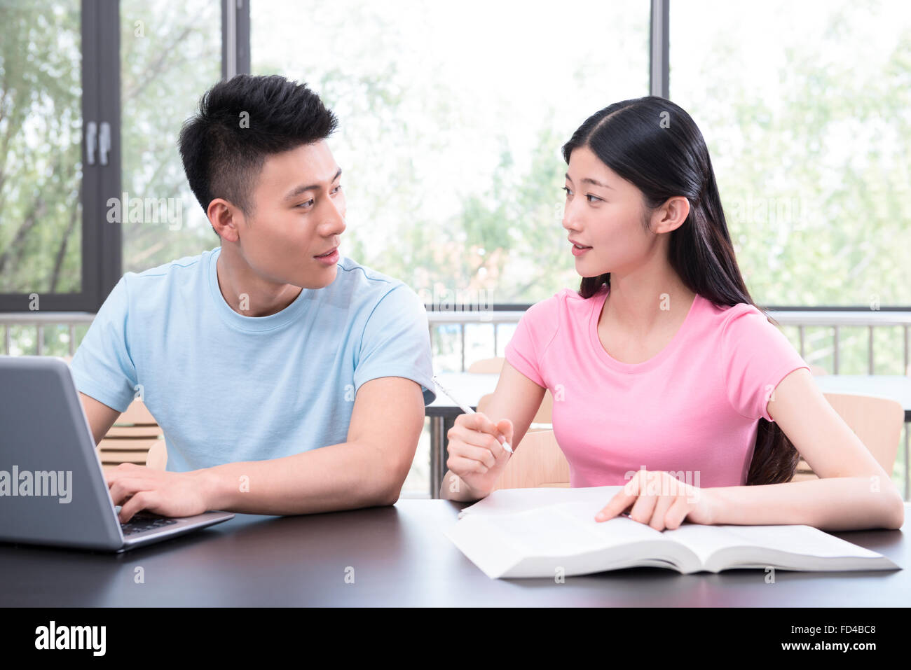 College students studying in library Stock Photo - Alamy