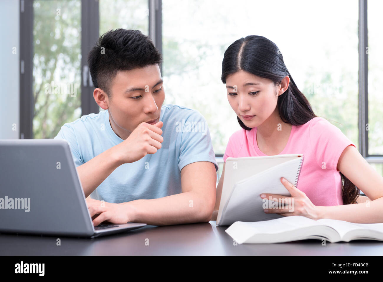 College students studying in library Stock Photo - Alamy