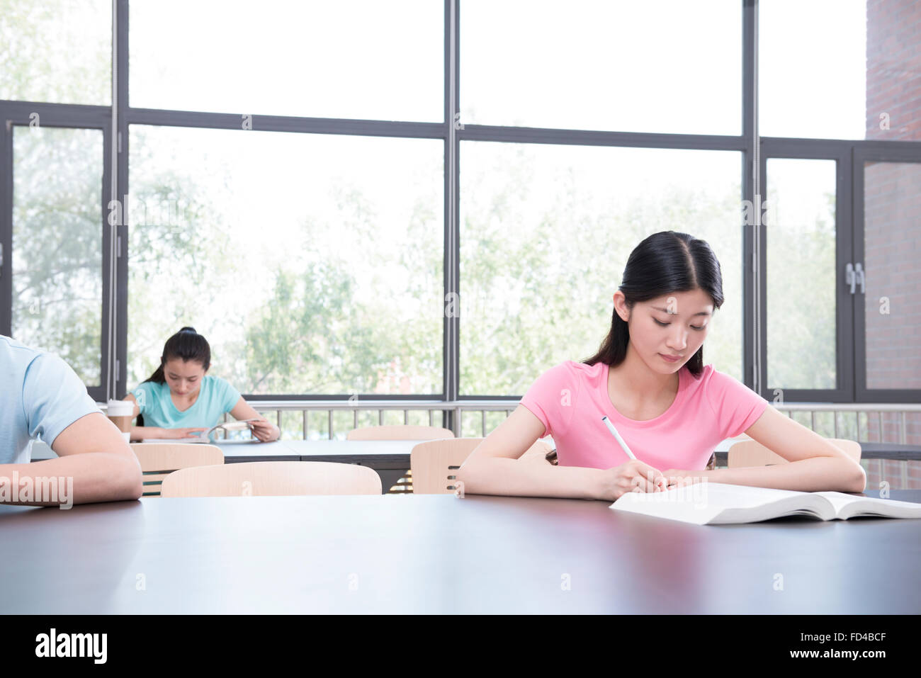 Studying in college education hi-res stock photography and images - Alamy